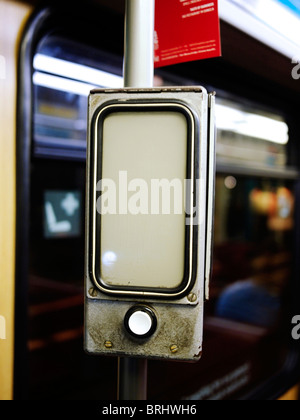 Stop button in city tram. Button open door request in public transport ...