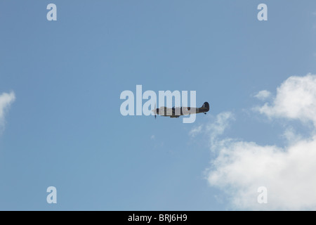 RAF Spitfire Plane in flight Stock Photo - Alamy