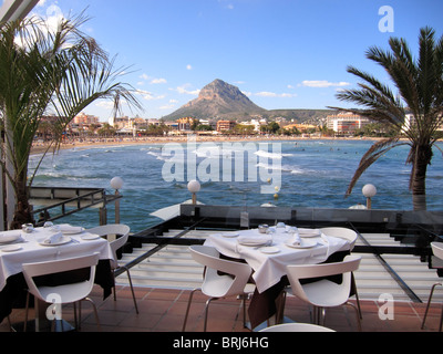 Mount Montgo towers over the Spanish coastal resort of Javea Stock ...