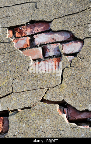 Decaying cement rendered brick wall Stock Photo - Alamy