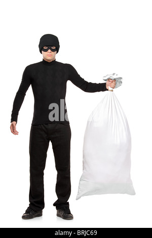 Full length portrait of a robber with robbery mask holding a flashlight ...