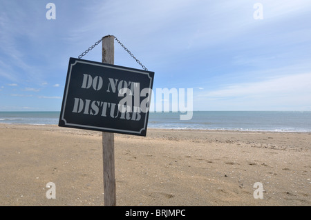 Do Not Disturb Sign on the beach Stock Photo - Alamy