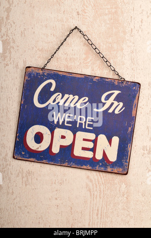 A blue sign with an open word Stock Photo - Alamy