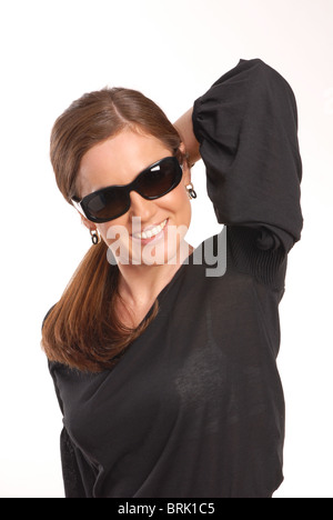 Young beautiful brunette business woman over isolated background ...