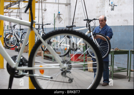 Worker at the assembly line of a bicycle factory Stock Photo: 31775832 ...
