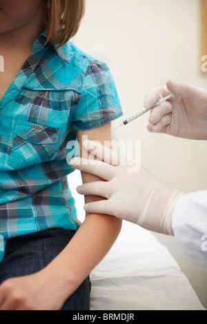 Child having an injection Stock Photo: 134199410 - Alamy