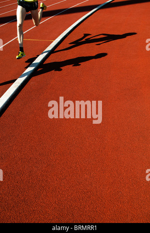 shadows of runners during 800m race during outdoor track and field ...