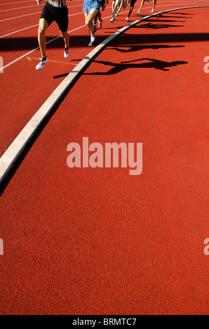 shadows of runners during 800m race during outdoor track and field ...