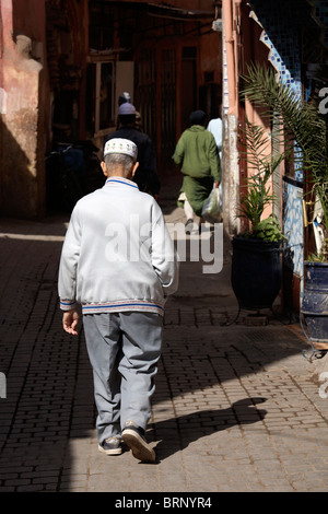 Marrakesh, Morocco: Elderly Moroccan man wearing a white kaftan and a ...