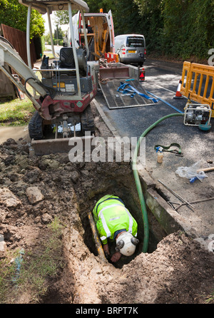 Workmen repair a burst water main in the road. Picture by James Stock ...