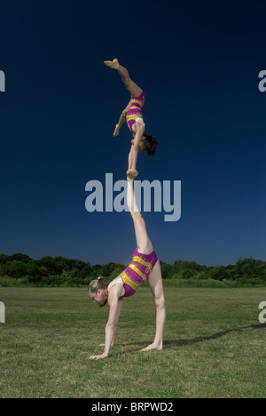 Acrobatic troop performing moves Stock Photo - Alamy