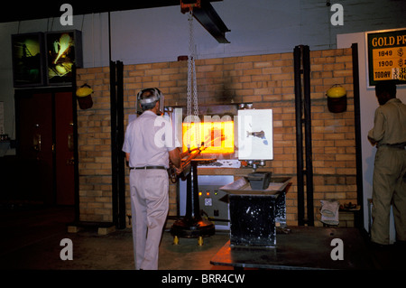 Gold being melted in a furnace Stock Photo - Alamy