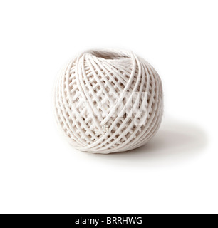 Ball of white cotton twine on a white background with red-handled ...