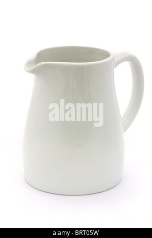 Ceramic milk jug isolated on white background Stock Photo - Alamy