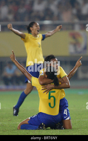 Brazilian players celebrate after their 4-0 win over China in their ...