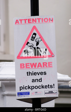 Warning sign theft thieves notice danger Stock Photo - Alamy
