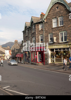 Shops stores in Ambleside town centre in summer Cumbria England UK ...