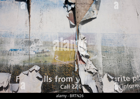 Peeling billboard poster sheets near 2012 Olympic Park construction ...