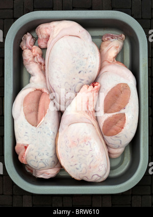 Raw bulls testicles on roasting tray Stock Photo - Alamy