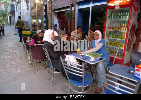 SYRIA Cafe with young women smoking sheesha pies. Damascus. PHOTOGRAPH ...
