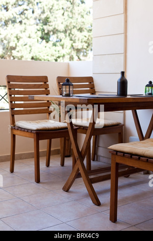 Vertical shot of a stone table and chairs with a chess design Stock ...