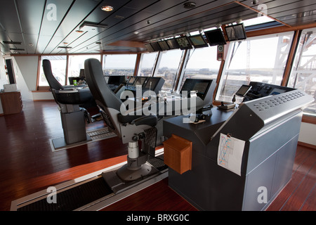 The Modern Ship’s Bridge control console with navigational equipment of ...