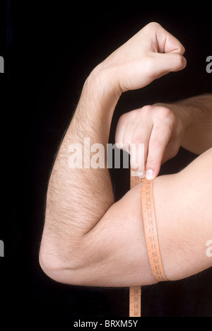 Black man, tape measure and bicep with muscle and strong athlete ...
