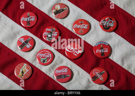 Coca-Cola badges pinned to an American flag Stock Photo - Alamy