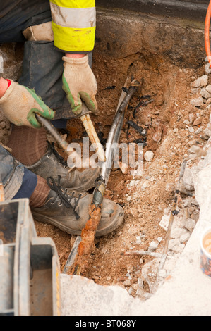 Underground steel armoured high voltage cable being isolated / cut and ...