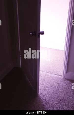 Open doorway leading to a , well-lit interior space featuring a full ...
