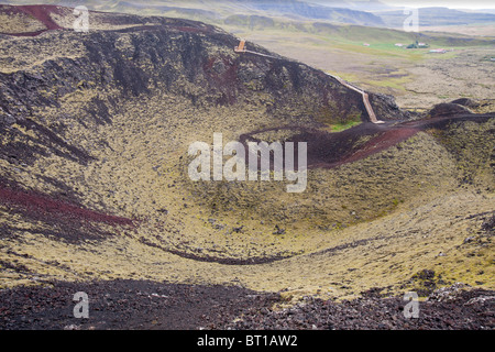 Fissure caused by volcanic eruption, moss-covered volcanic landscape ...