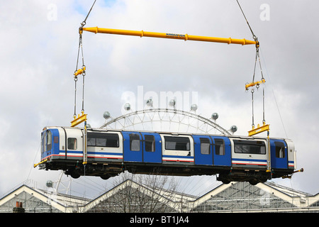 A tube train carriage is lifted out of the Waterloo and City tube line ...
