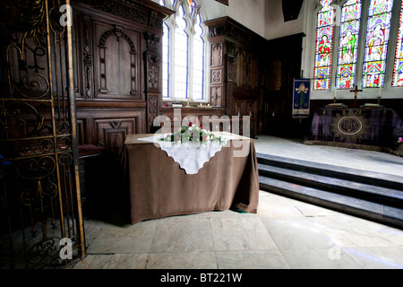 The front and altar area of a Gothic styled Anglican Church in England ...