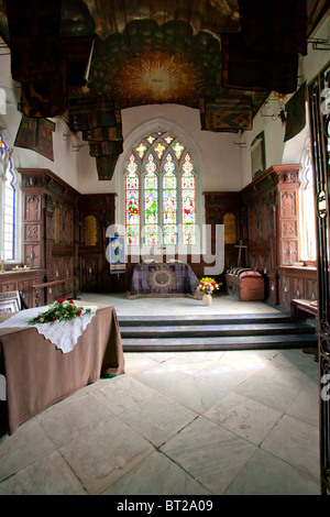 The front and altar area of a Gothic styled Anglican Church in England ...