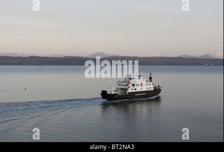 Skye ferry leaving Mallaig at dawn with isle of Eigg Scotland October ...