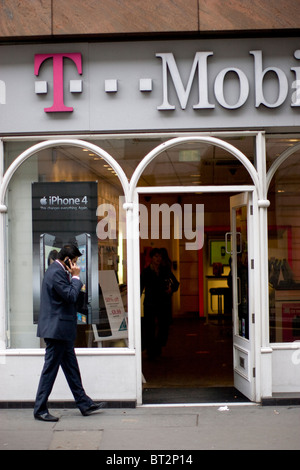 Tmobile T mobile phone retail outlet London UK with mobile phone user ...