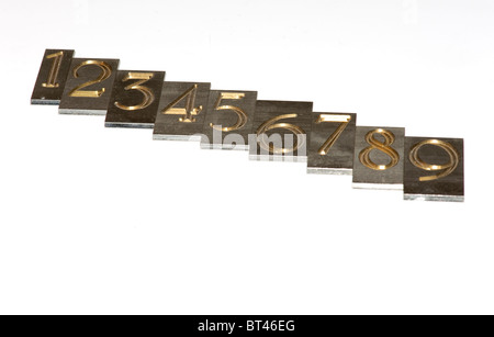 Numbers used for engraving Stock Photo - Alamy