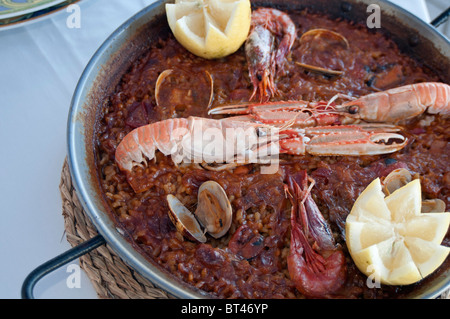Paella pan with seafood in a restaurant in the coastal town of Fano at ...