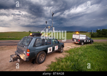 A Vortex 2 probe truck parked in front of a Minuteman Missile nuclear ...
