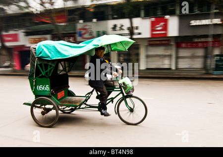 Cycles in everyday scenes in China Stock Photo - Alamy