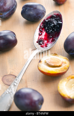 Jam on spoon Stock Photo - Alamy