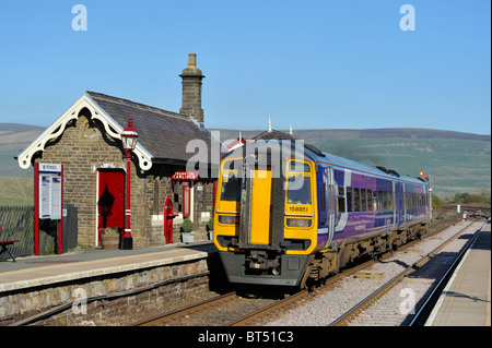 A Northern Rail class 158 passenger train at Brough railway station ...