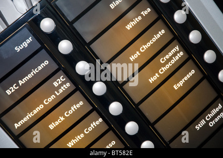 Vending machine panel showing buttons and drink choices Stock Photo - Alamy