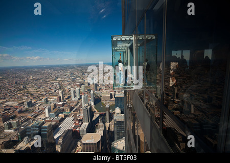 Tourists in glass balcony skydeck observation deck view Chicago ...