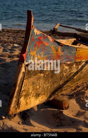 Pirogue at sunset Stock Photo - Alamy