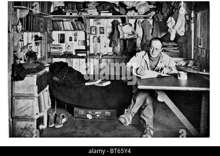 Captain Robert Falcon Scott writing in his diary in his hut at Cape ...
