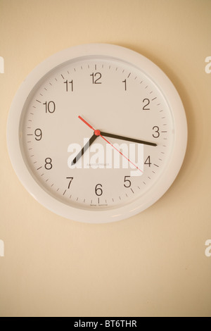 wall clock showing time at seven o clock 0700 1900 Stock Photo - Alamy