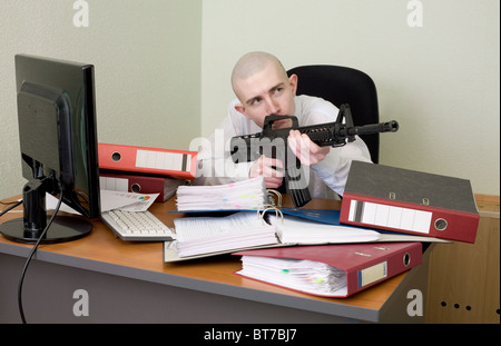 The chief accountant armed with a rifle Stock Photo - Alamy