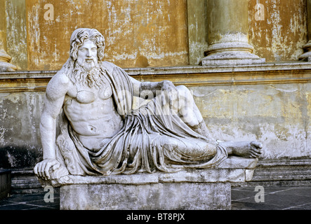 Antique statue of a reclining god, Braccio Nuovo new wing, Cortile ...