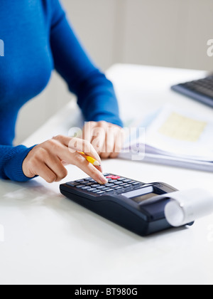 Closeup of businesswoman hand typing on keyboard with mouse on w Stock ...